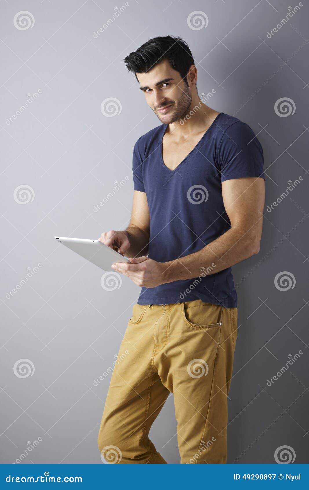 Handsome Young Man Using Tablet Stock Image - Image of male, smile ...