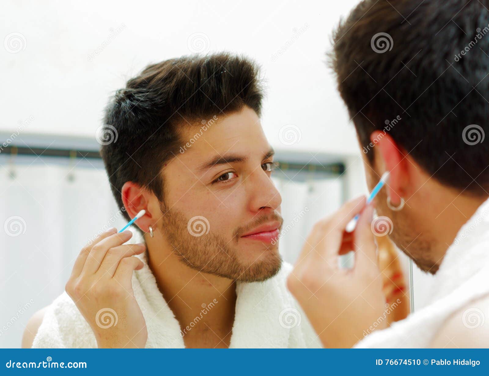 Handsome Young Man Wearing Black Singlet Top Looking in Mirror, Using Q ...
