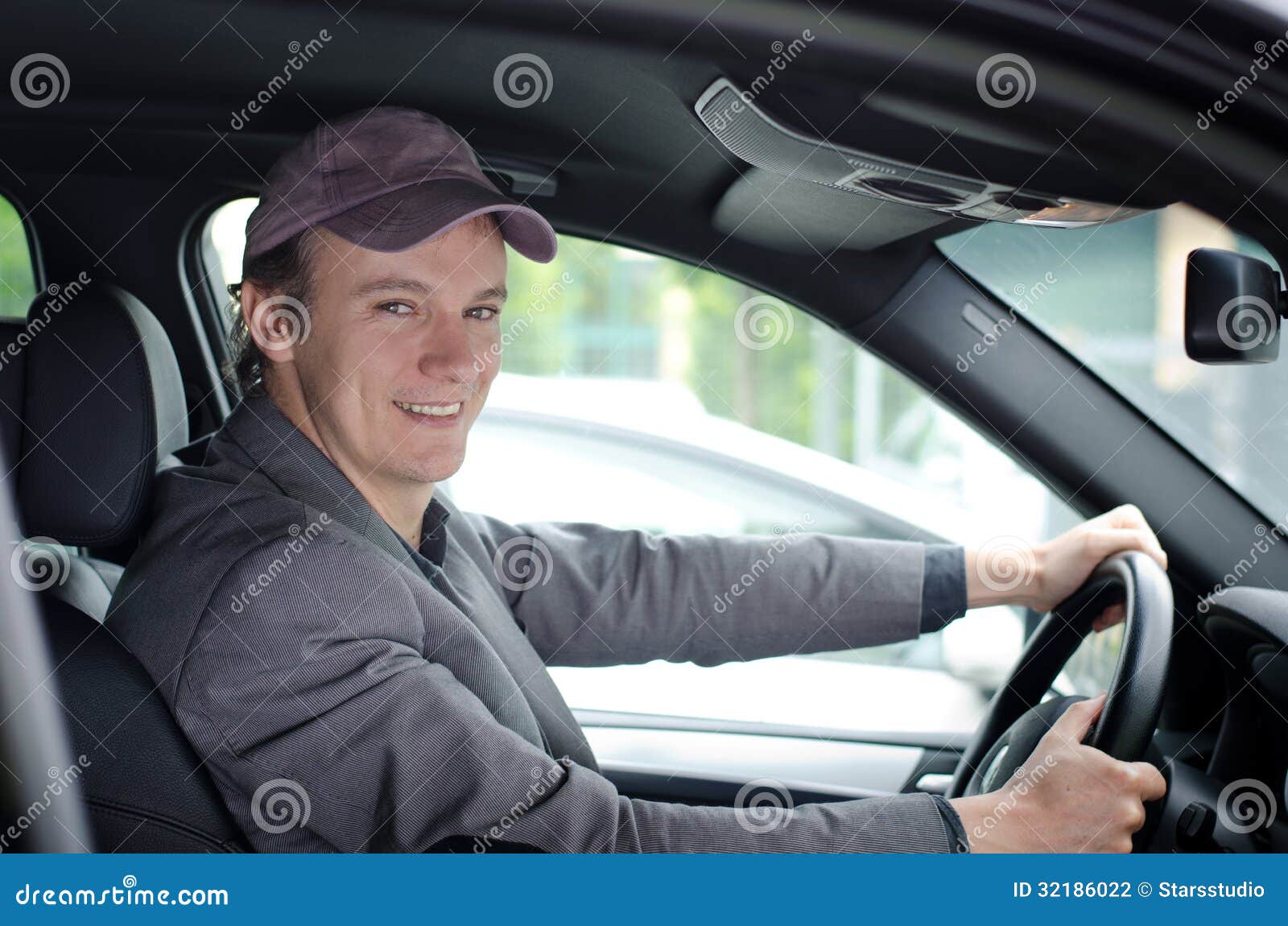 Handsome Young Man at Wheel Driving Car Stock Photo - Image of auto ...