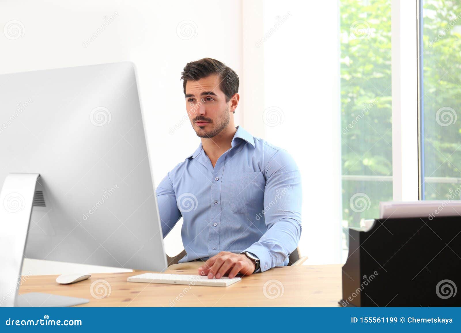Handsome Young Man Working with Computer at Table Stock Image - Image ...
