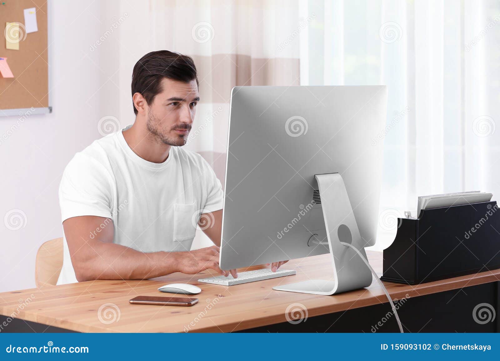 Handsome Young Man Working with Computer at Table Stock Photo - Image ...