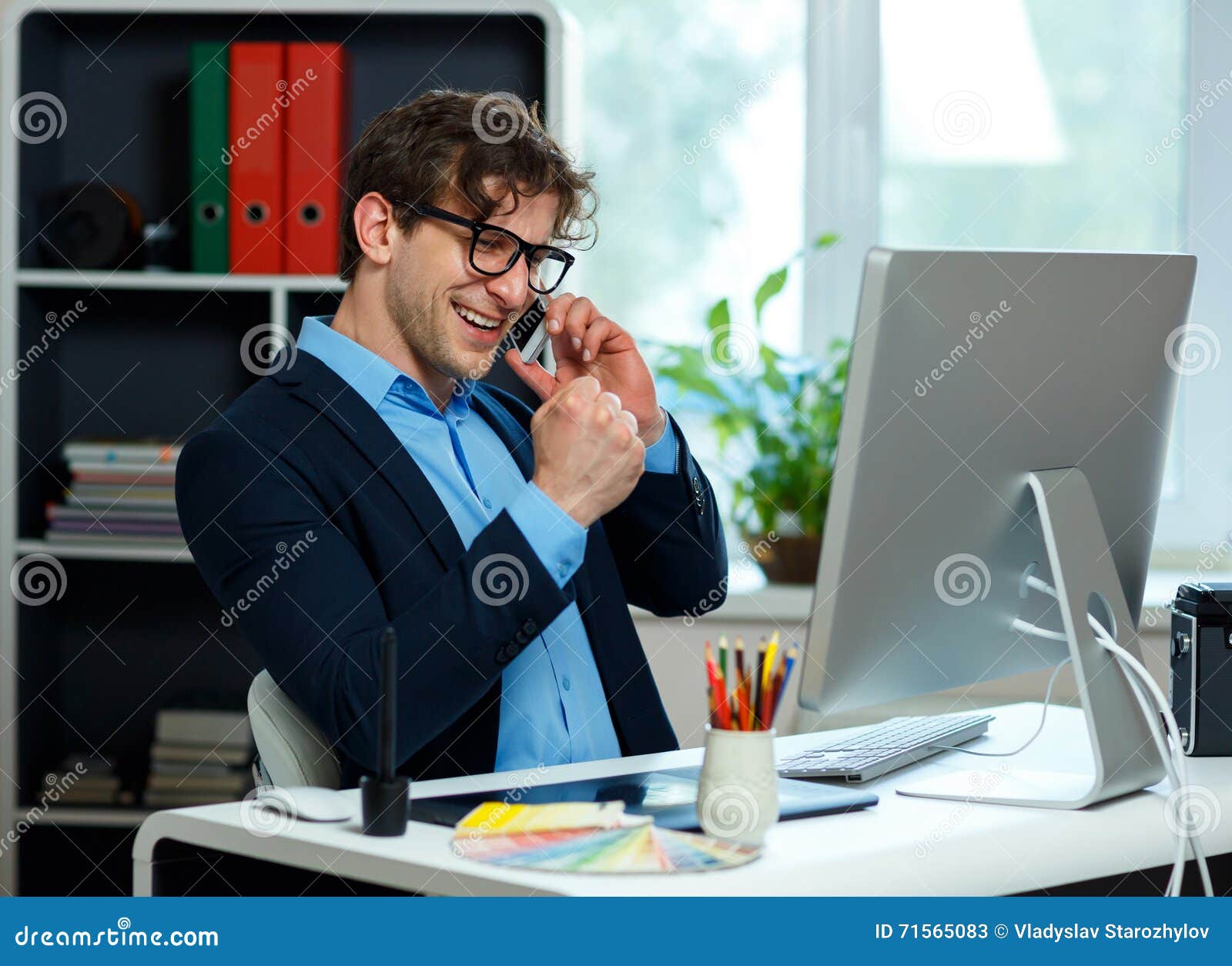 Handsome Young Man Working from Home Office and Using Smartphone Stock ...