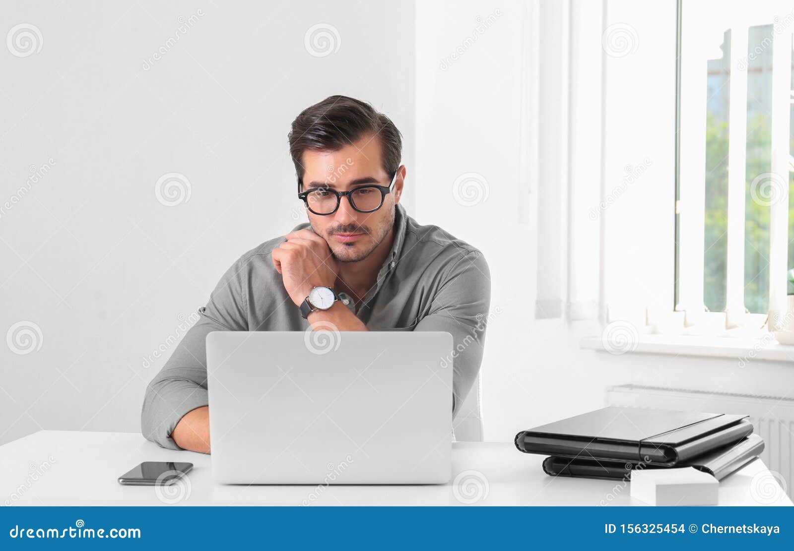 Handsome Young Man Working with Laptop at Table Stock Photo - Image of ... Handsome Young Man Working with Laptop at Table Stock Photo - Image of ...