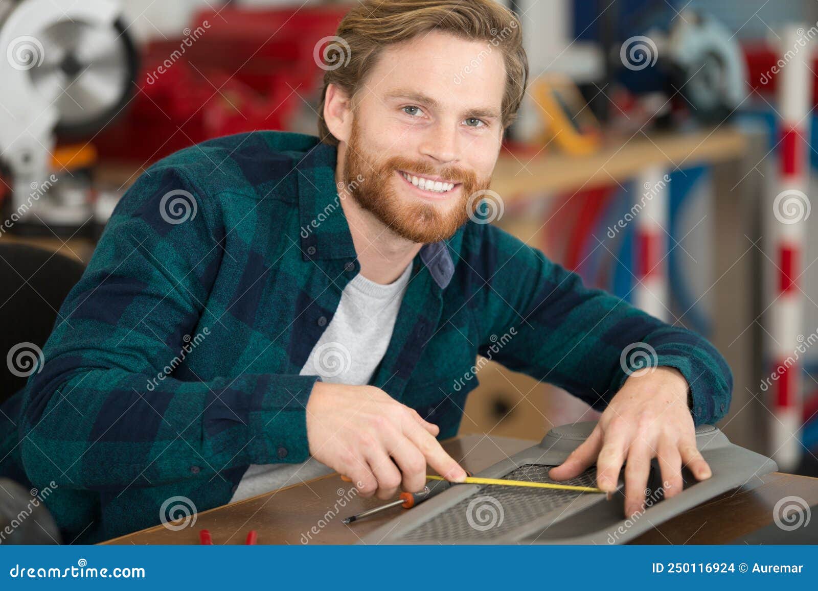 Handsome Young Mechanic Smiling at Camera Stock Photo - Image of young ...