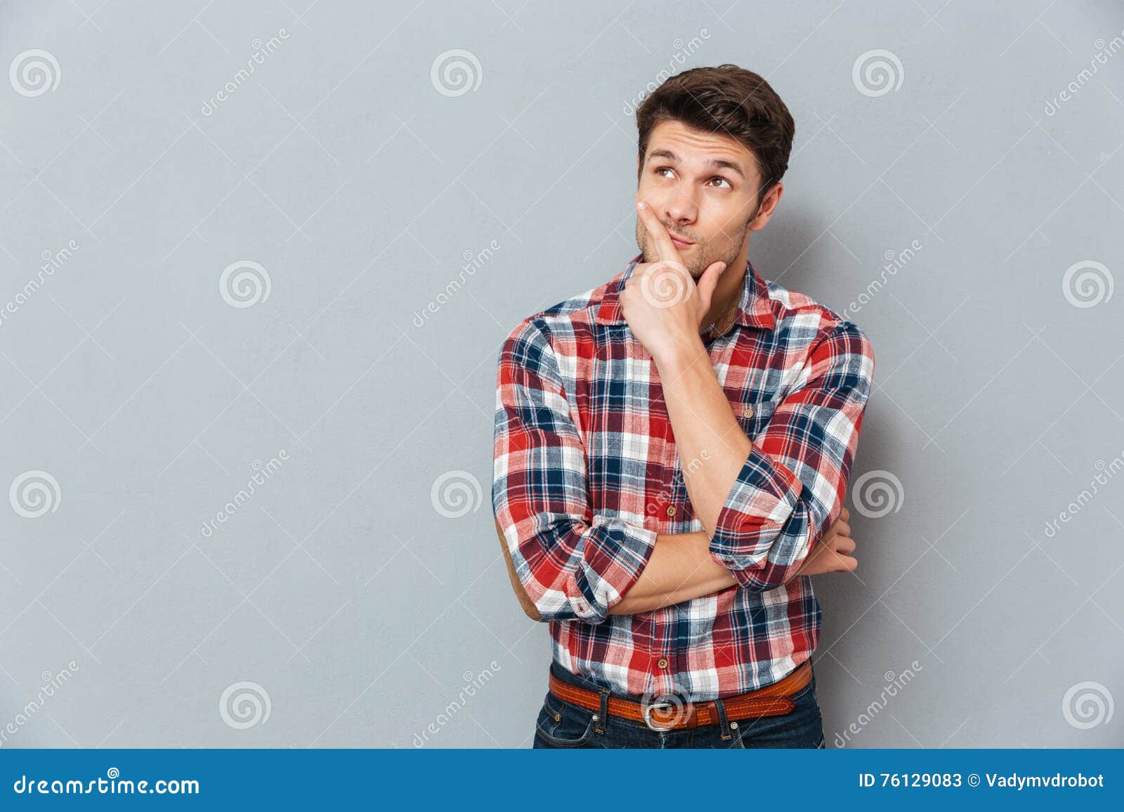 Handsome Young Pensive Man Standing and Looking Up Stock Image - Image ...