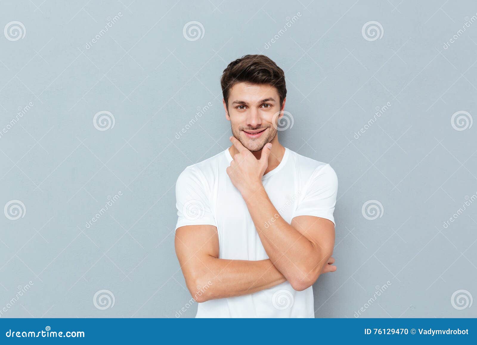 Handsome Young Pensive Man Standing and Looking Up Stock Photo - Image ...