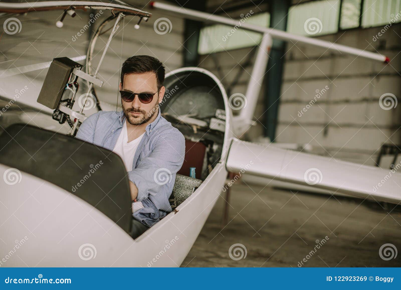 Young Pilot Checking Ultralight Airplane before Flight Stock Image ...