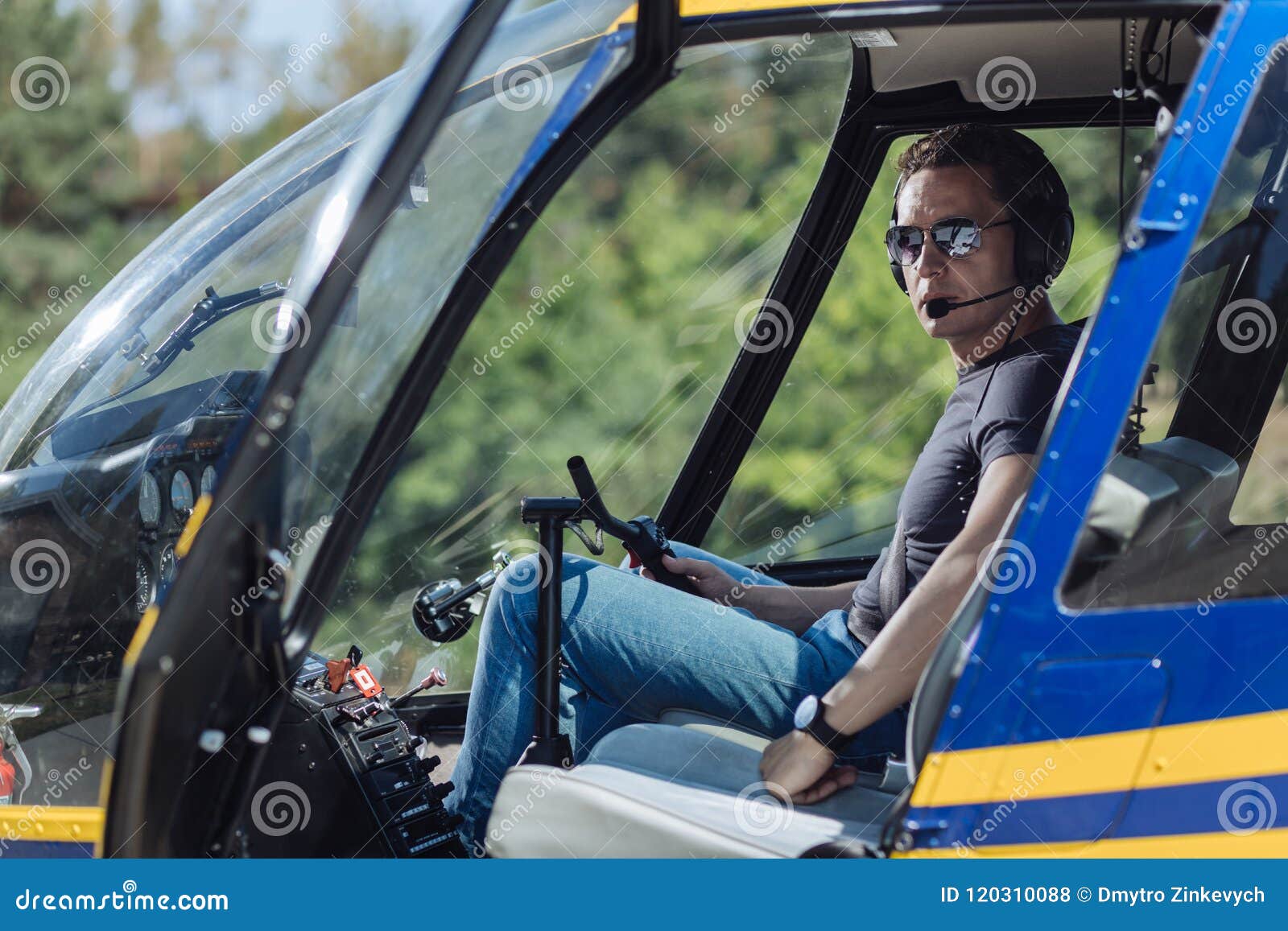 Handsome Young Pilot Posing Inside Helicopter Stock Photo - Image of ...