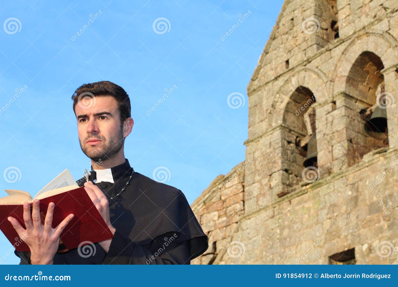 Handsome Young Priest Close Up with Copy Space Stock Photo - Image of ...
