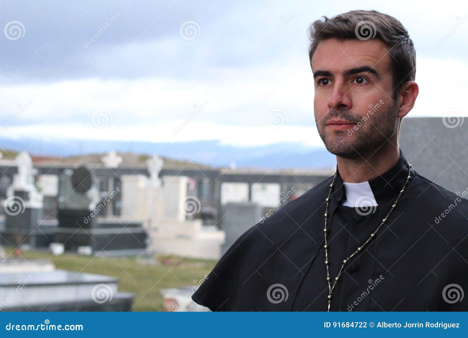 Handsome Young Priest Close Up Looking Away With Copy Space Stock Photo ...