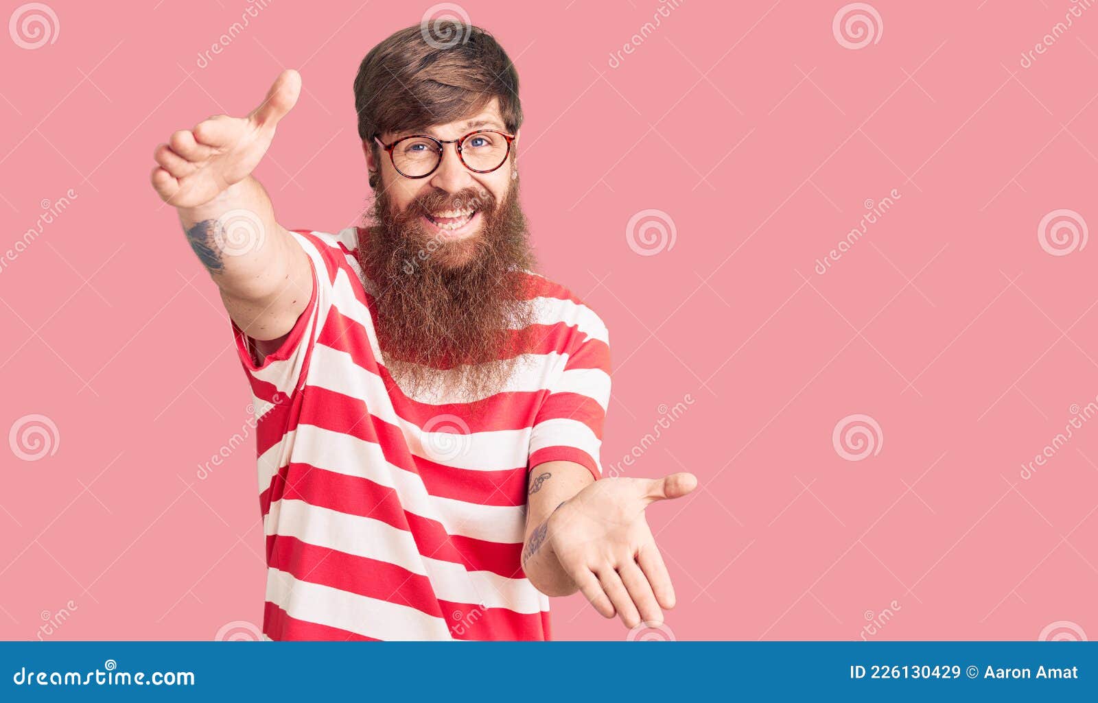Handsome Young Red Head Man With Long Beard Wearing Casual Clothes