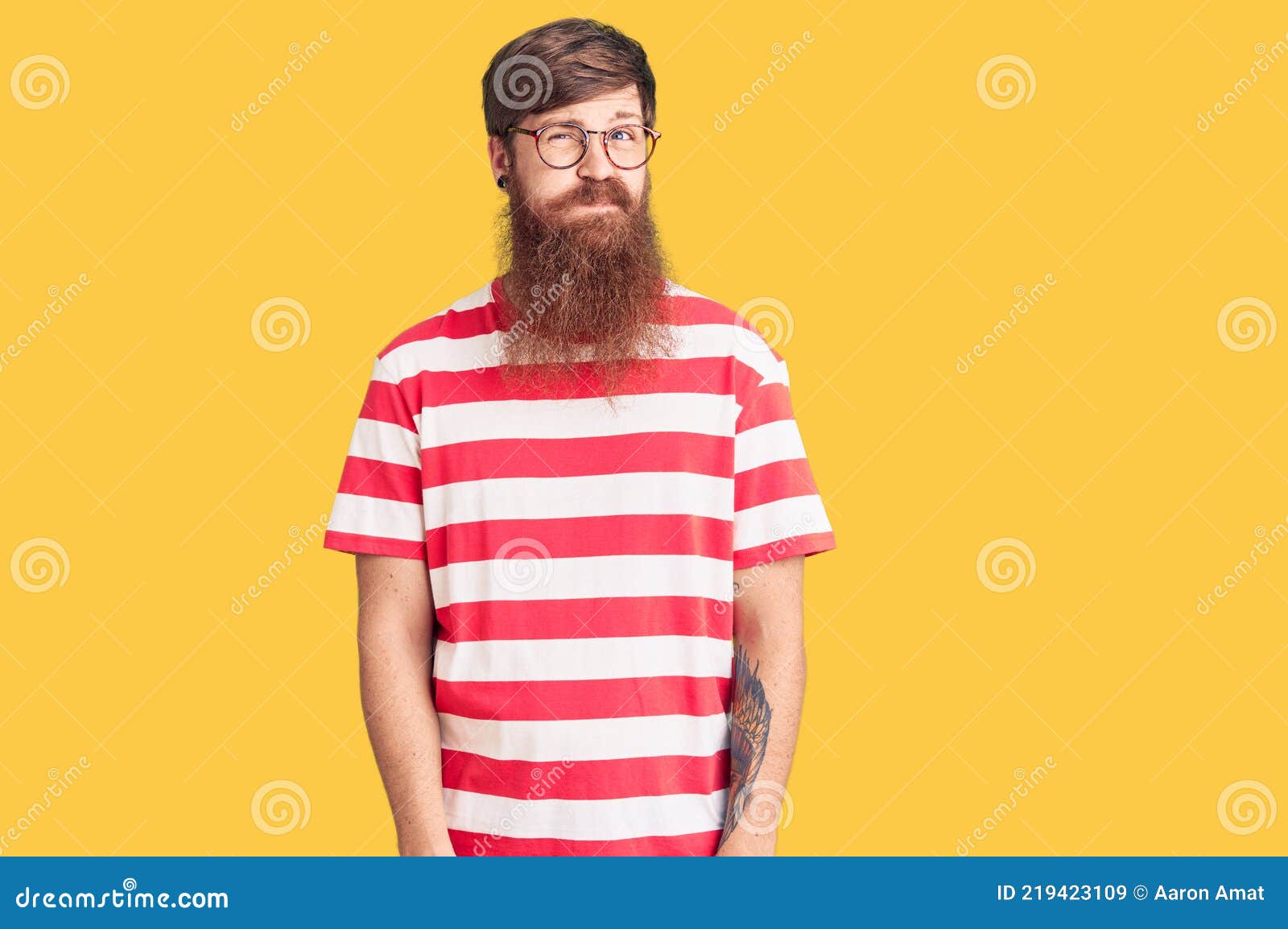 Handsome Young Red Head Man With Long Beard Wearing Casual Clothes