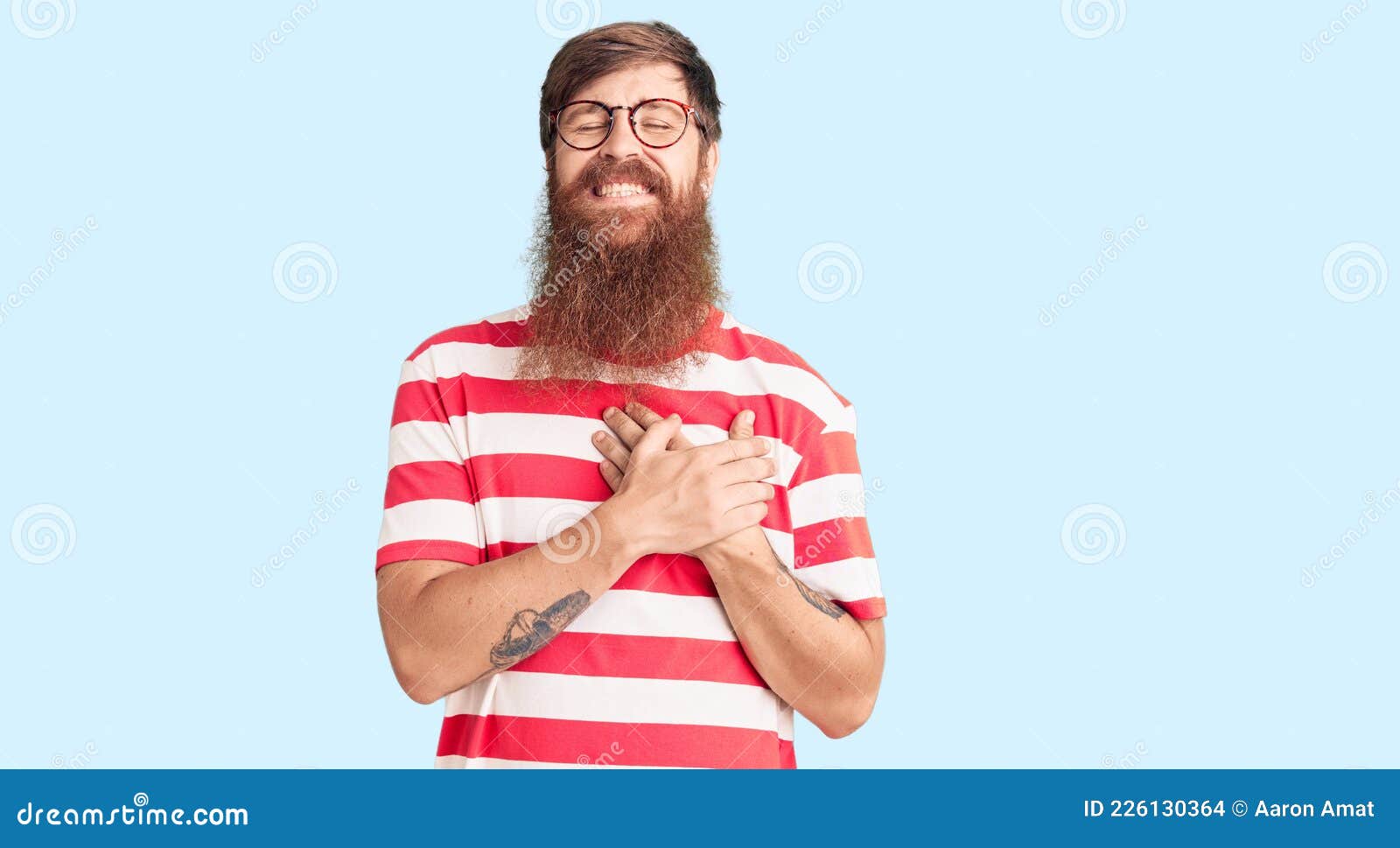Handsome Young Red Head Man With Long Beard Wearing Casual Clothes