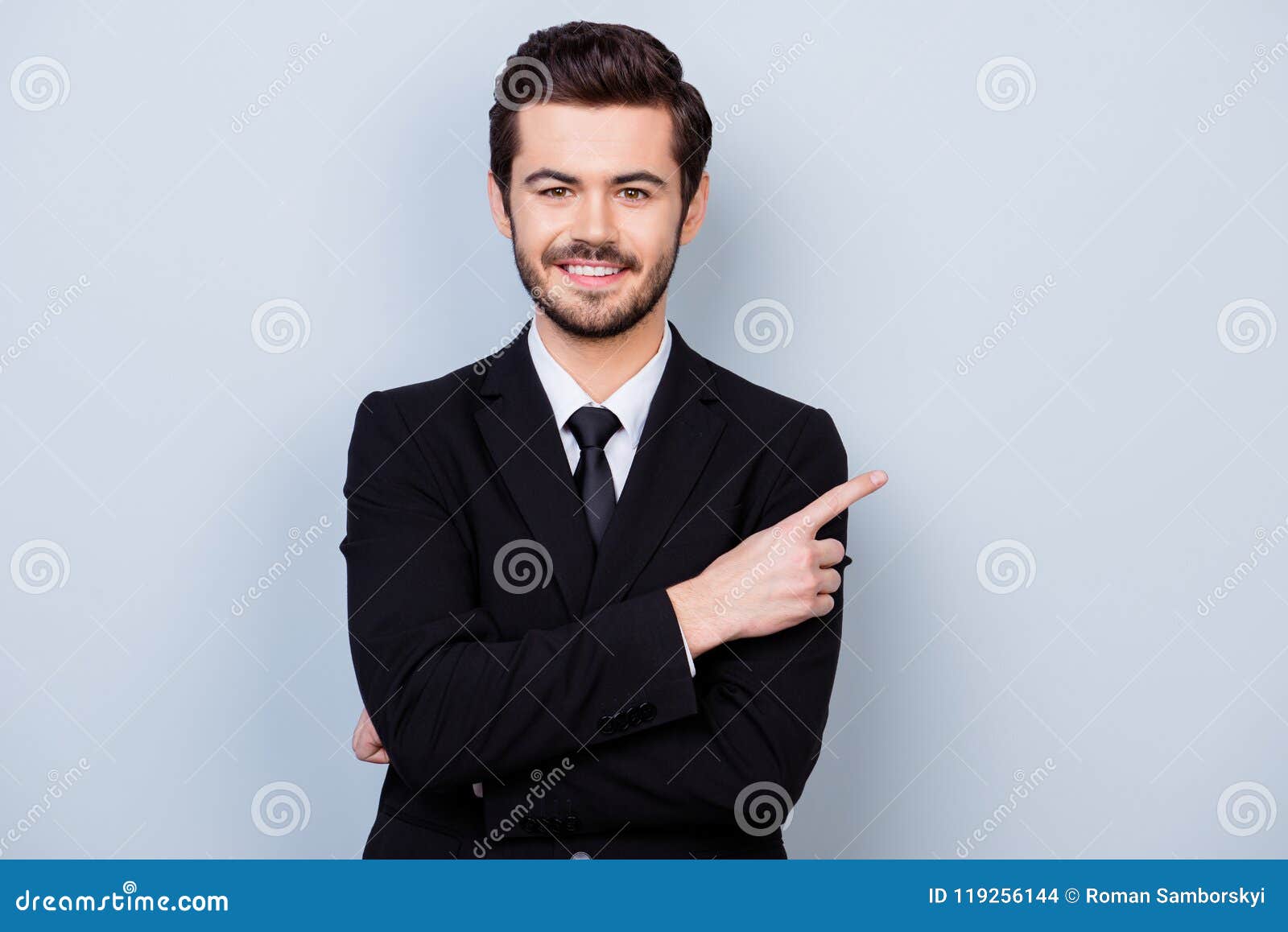 Handsome Young Smart with Beaming Smile Manager Pointing on Copy Stock ...