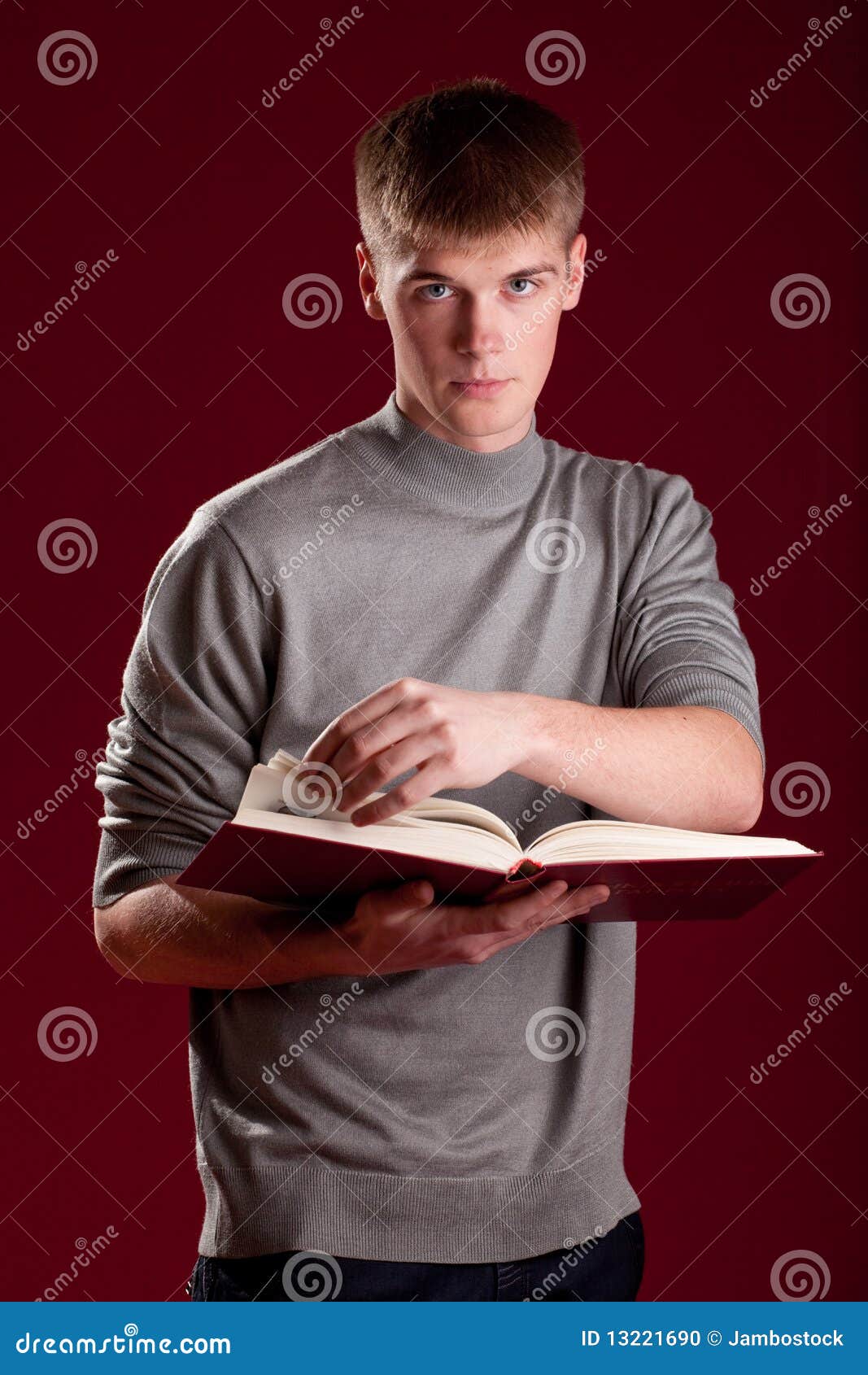 Handsome Young Student with Book Stock Photo - Image of individuality ...