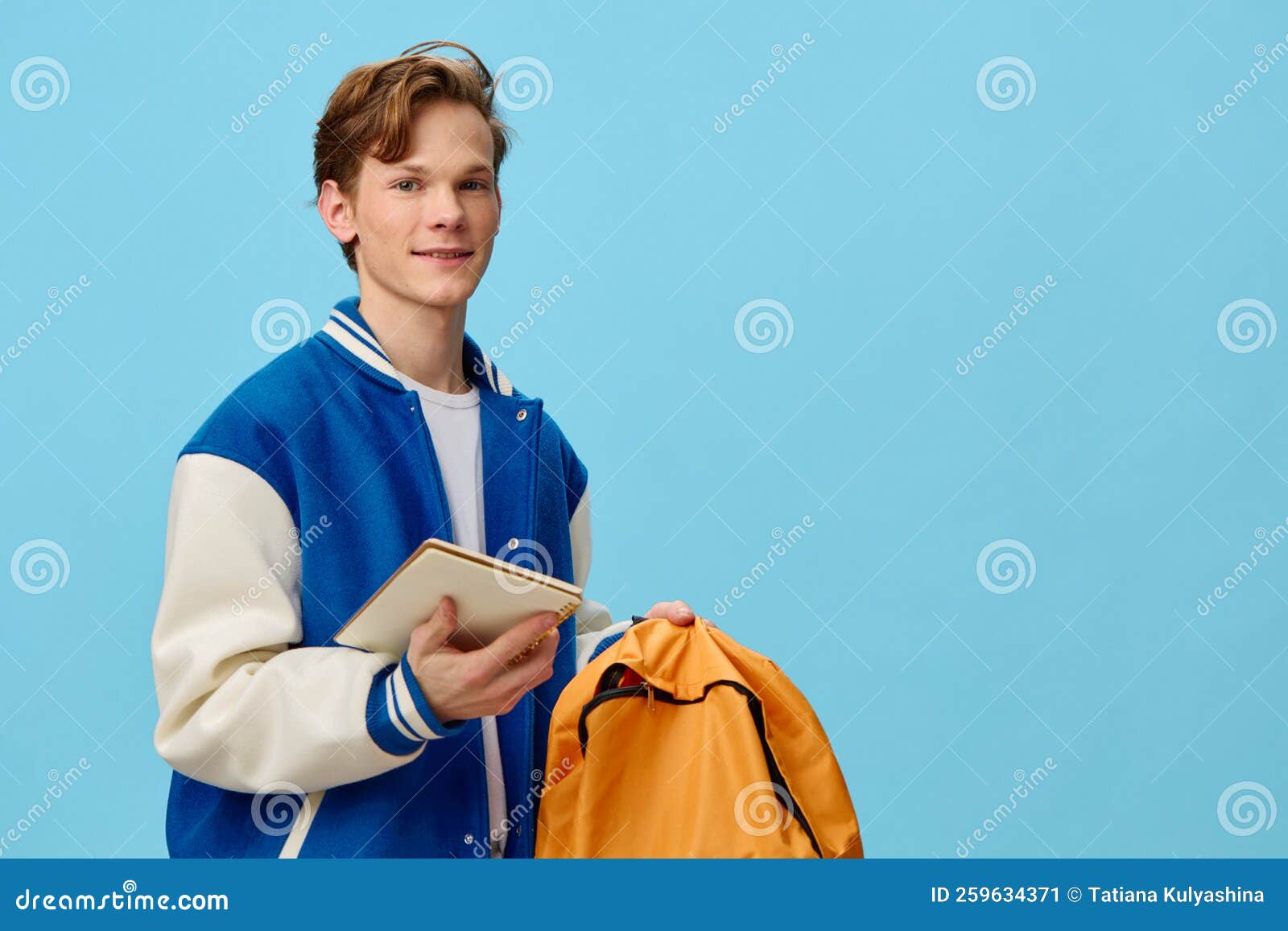 A Handsome Young Student is Getting Ready for the Study Season and ... A Handsome Young Student is Getting Ready for the Study Season and ...