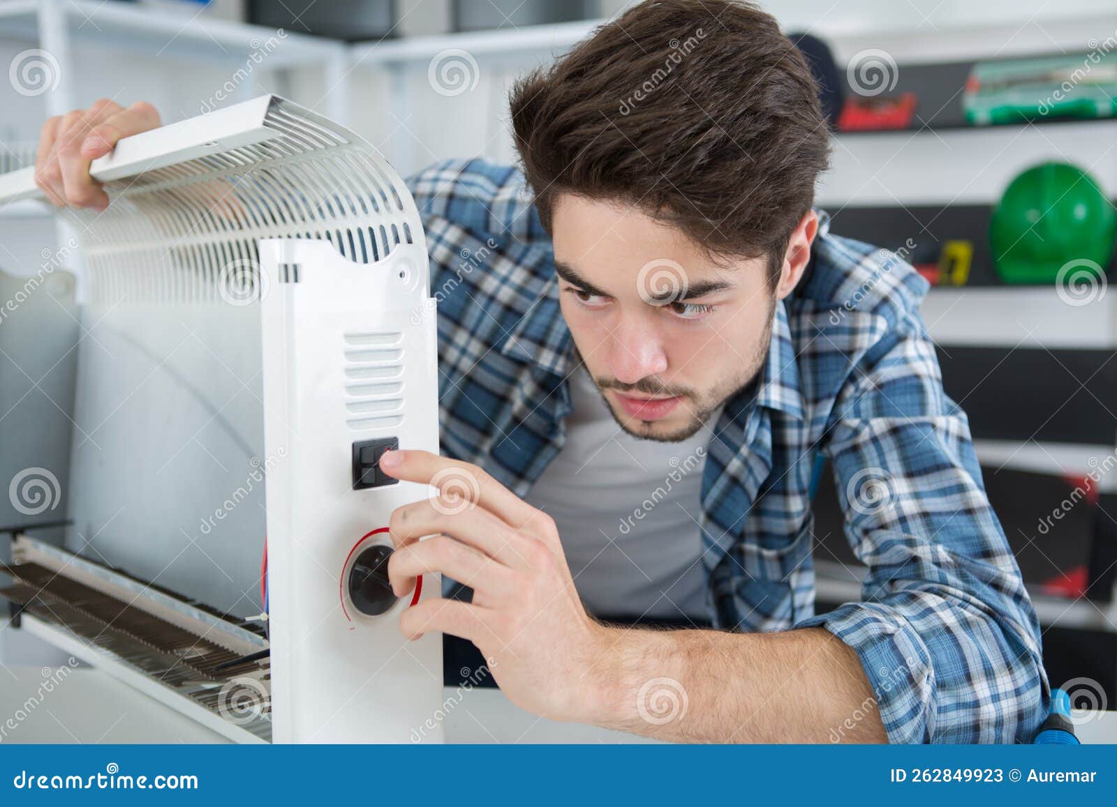 Handsome Young Technician Repairing Radiator Stock Image - Image of ...