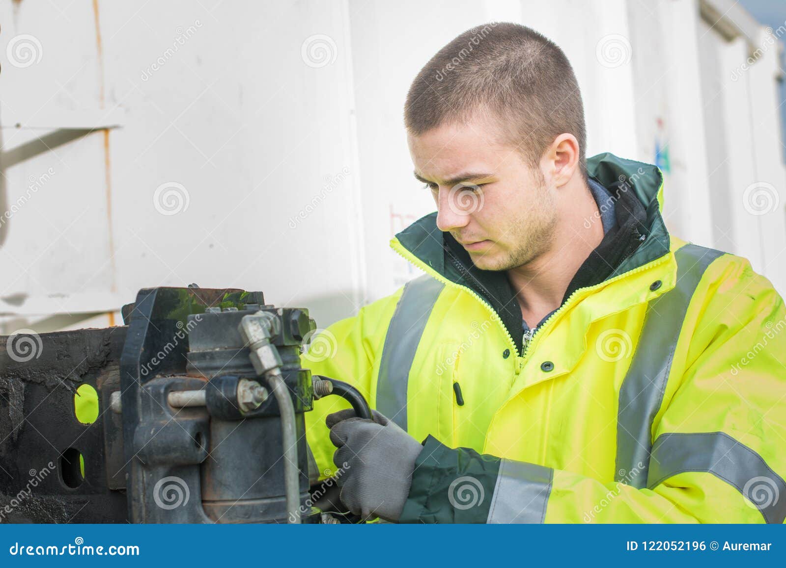 Handsome Young Worker Fixing Something Stock Photo - Image of ...