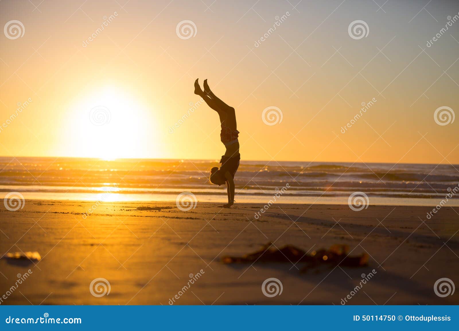 Handstand by the beach stock photo. Image of healthy - 50114750
