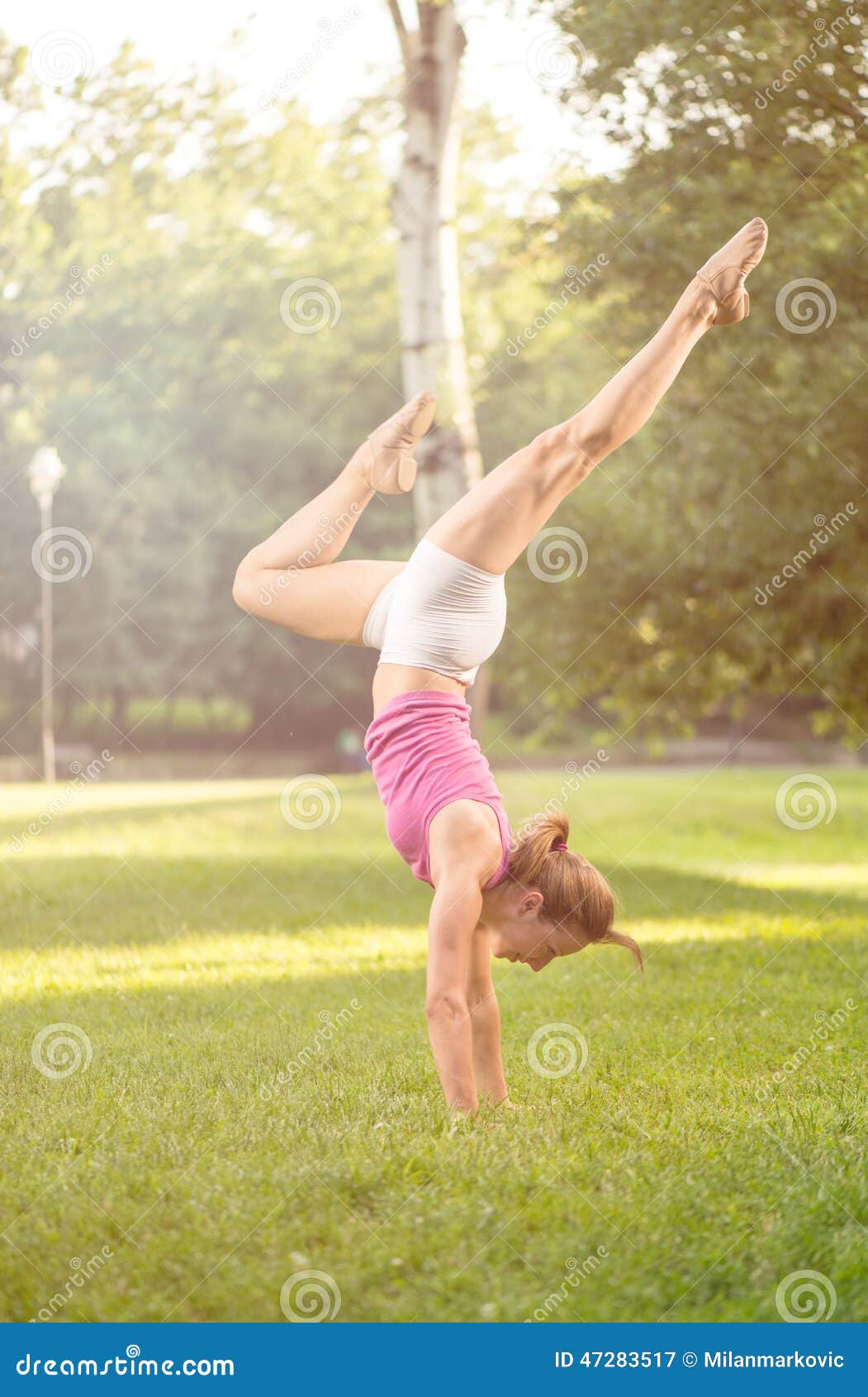 Handstand Exercise on Grass Stock Image - Image of outdoor, fitness ...