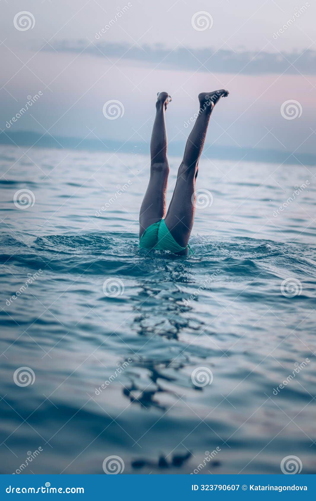 Handstand Under Water and Two Legs Over Sea Surface Stock Image - Image ...
