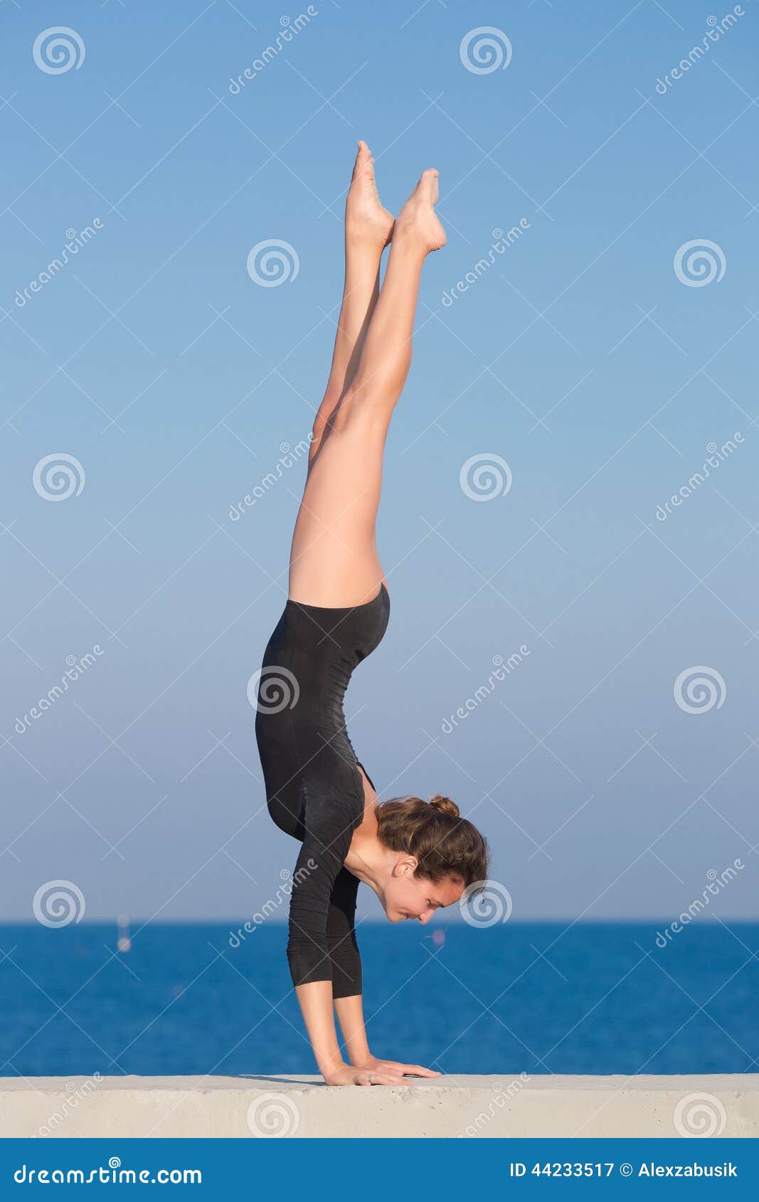 Handstand Young Fitness Woman On Grassland Royalty-Free Stock ...
