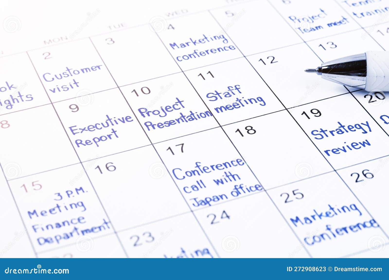 The Handwriting Scheduling Appointments on Calendar Sheet with Pen ...