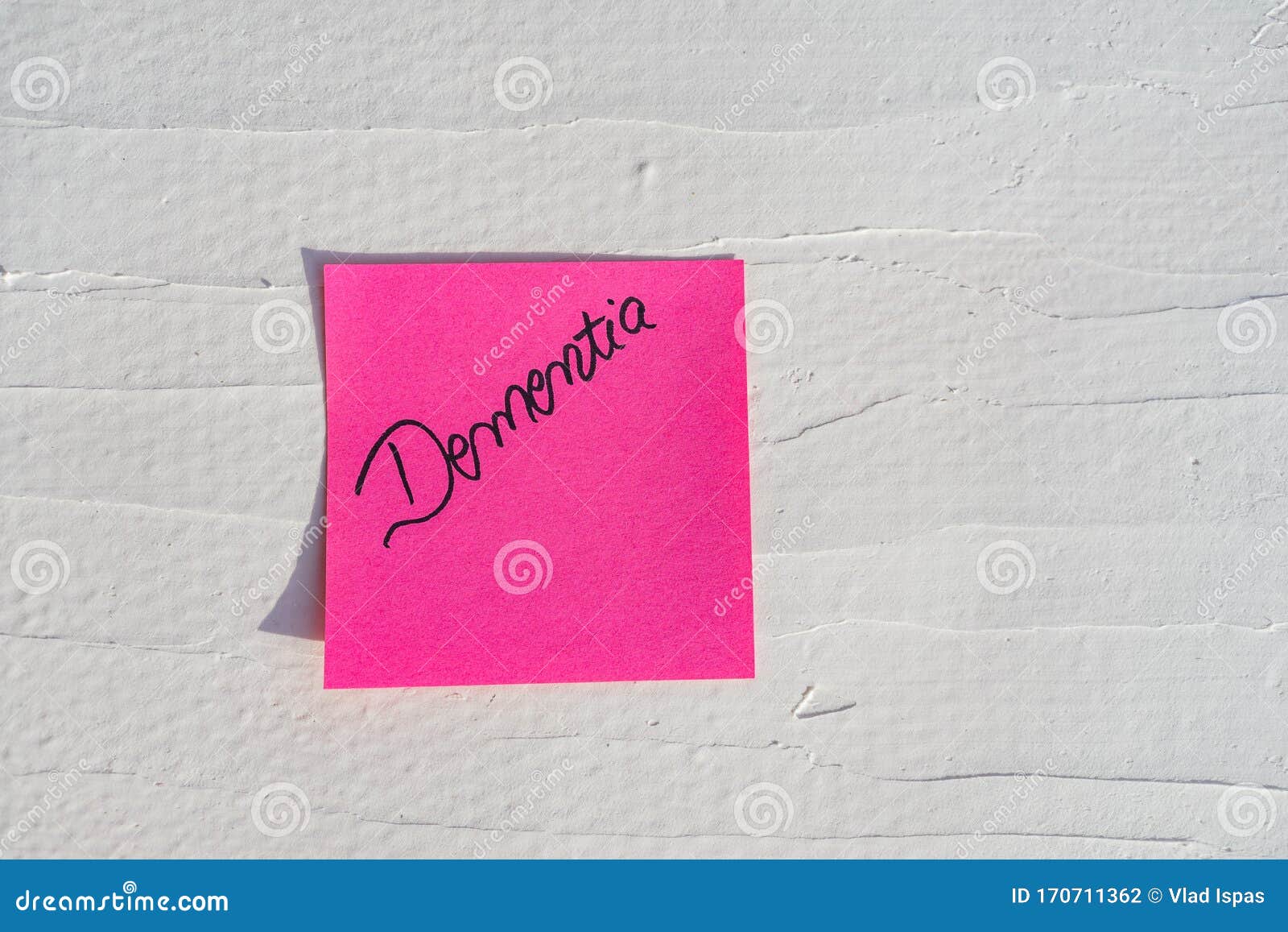 Handwriting Text on Memo Post Reminder. Dementia on Paper, on White and ...