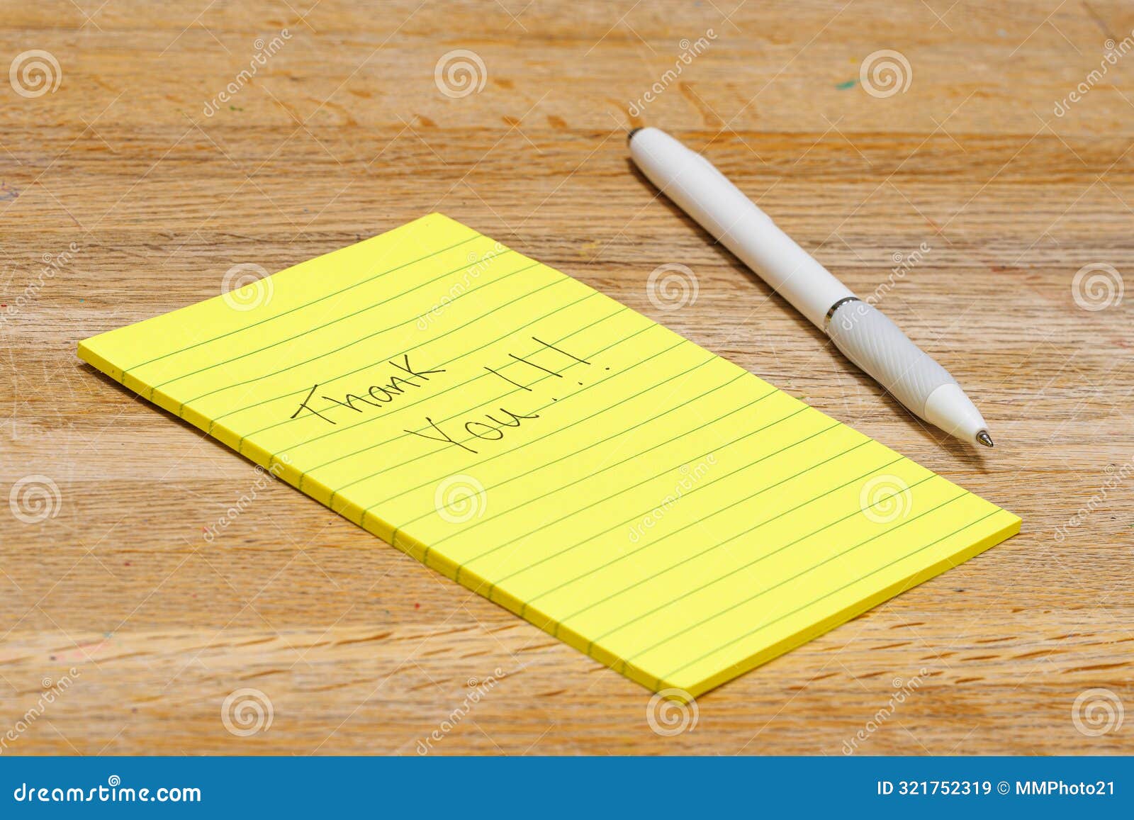 Handwritten Note Saying "Thank You" with Pen and Yellow Pad Stock Image ...