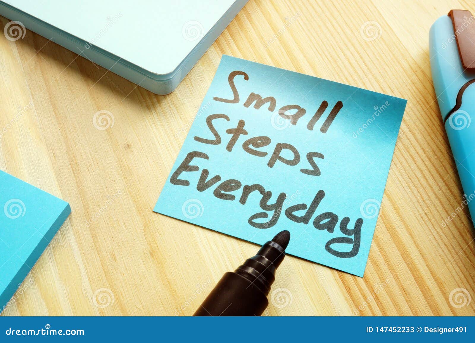 Handwritten Quote Small Steps Everyday on Table. Stock Image - Image of ...