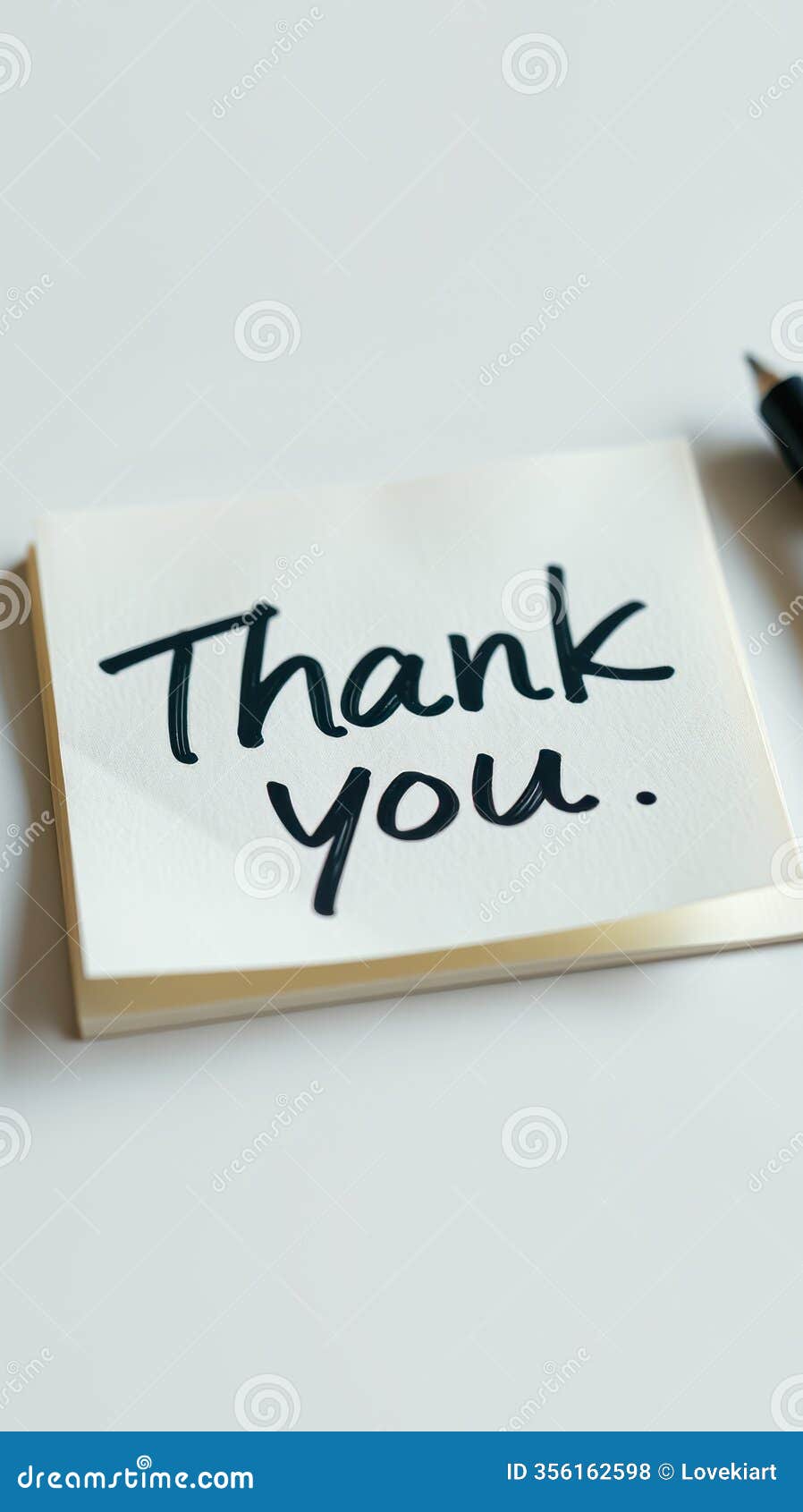 Handwritten Thank You Note on a Notepad beside a Pen on a Clean ...