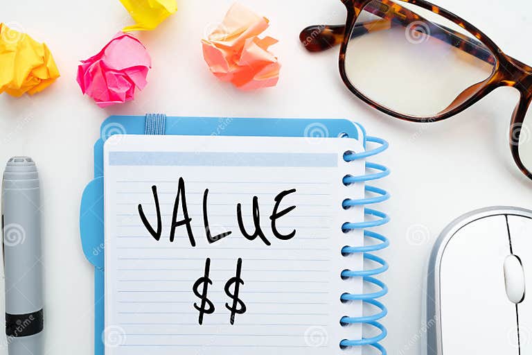 Handwritten VALUE DOLLAR Text on a Notebook, on an Office Table Stock ...