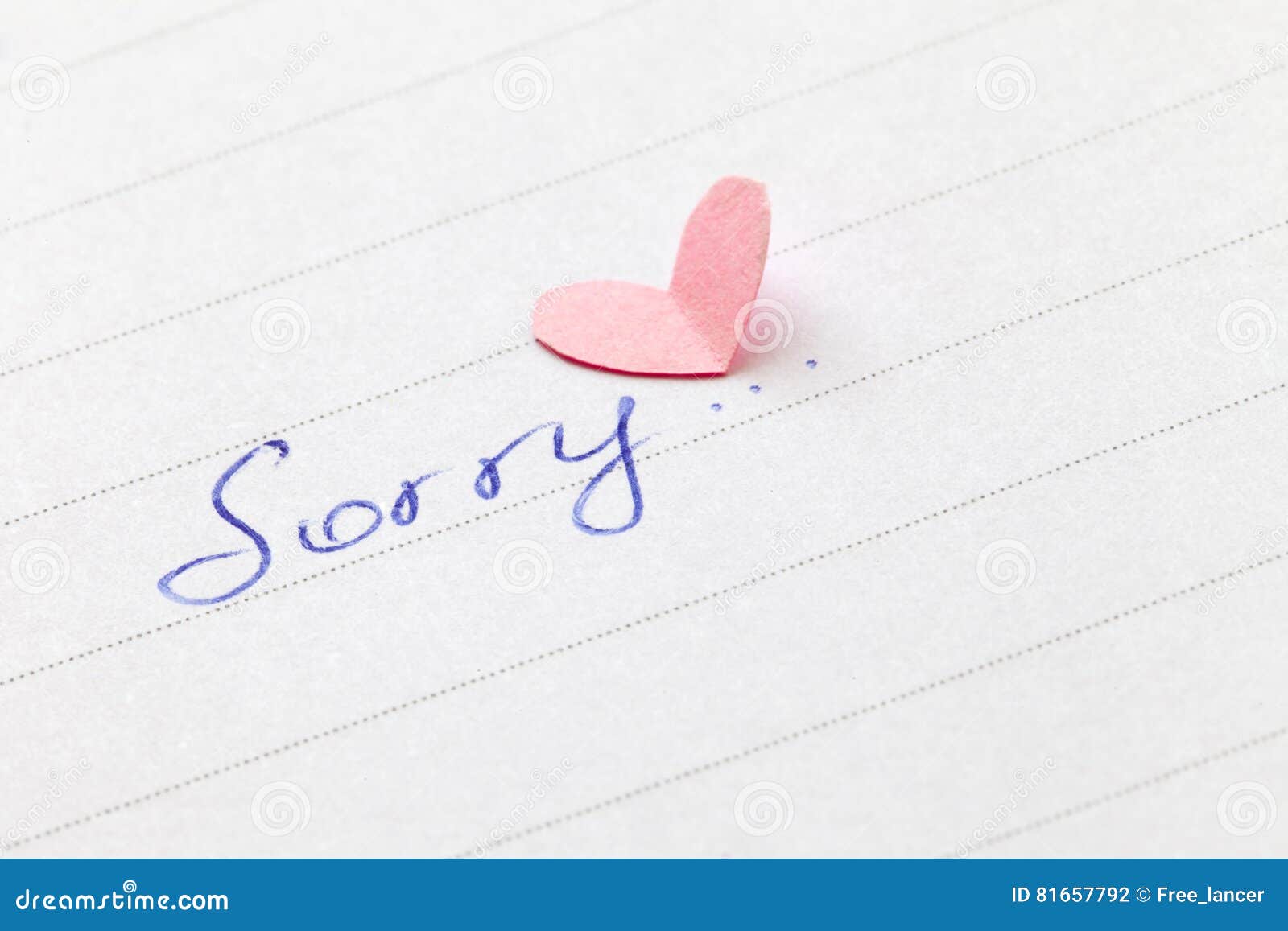 Handwritten Word Adieu In A White Piece Of Paper And A Wooden Amulet In ...