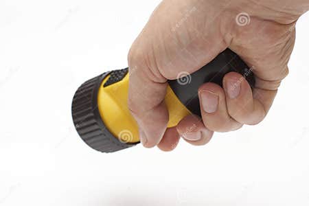 Handy LED torch in hand stock photo. Image of electrical - 25653538