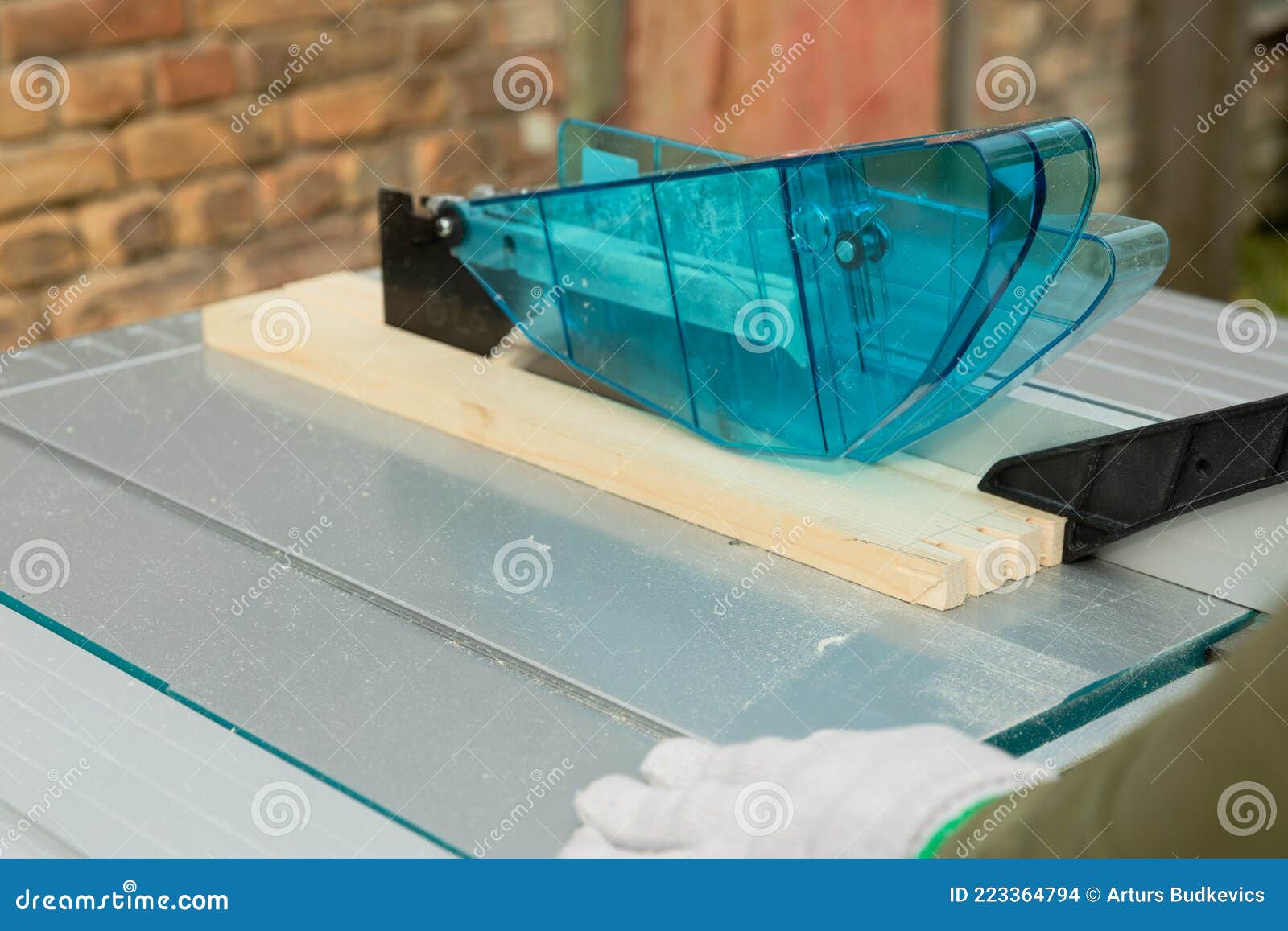 Handy Man Cutting Wood on a Table Saw. Carpentry Wood Work Stock Photo ...