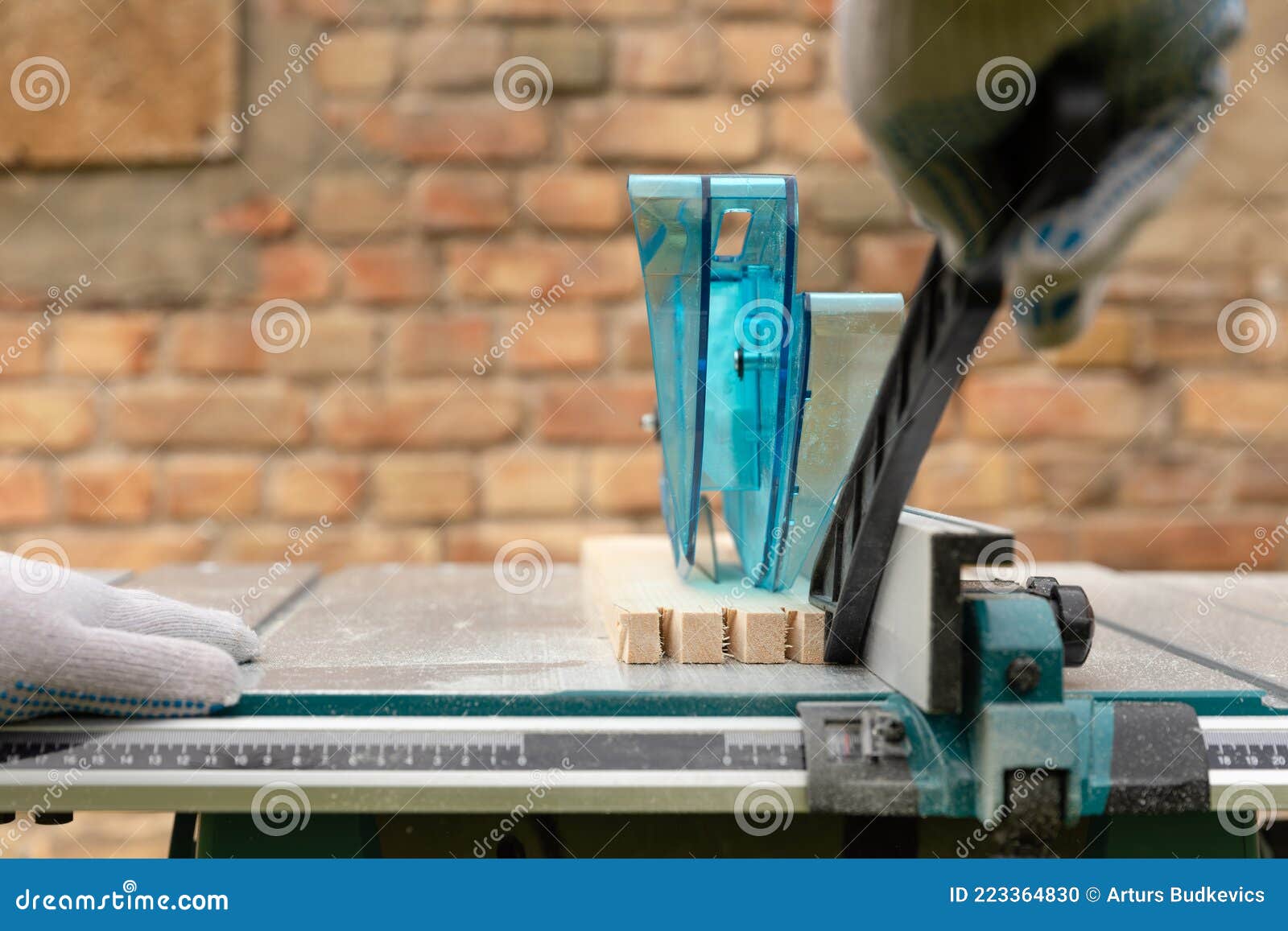 Handy Man Cutting Wood on a Table Saw. Carpentry Wood Work Stock Photo ...