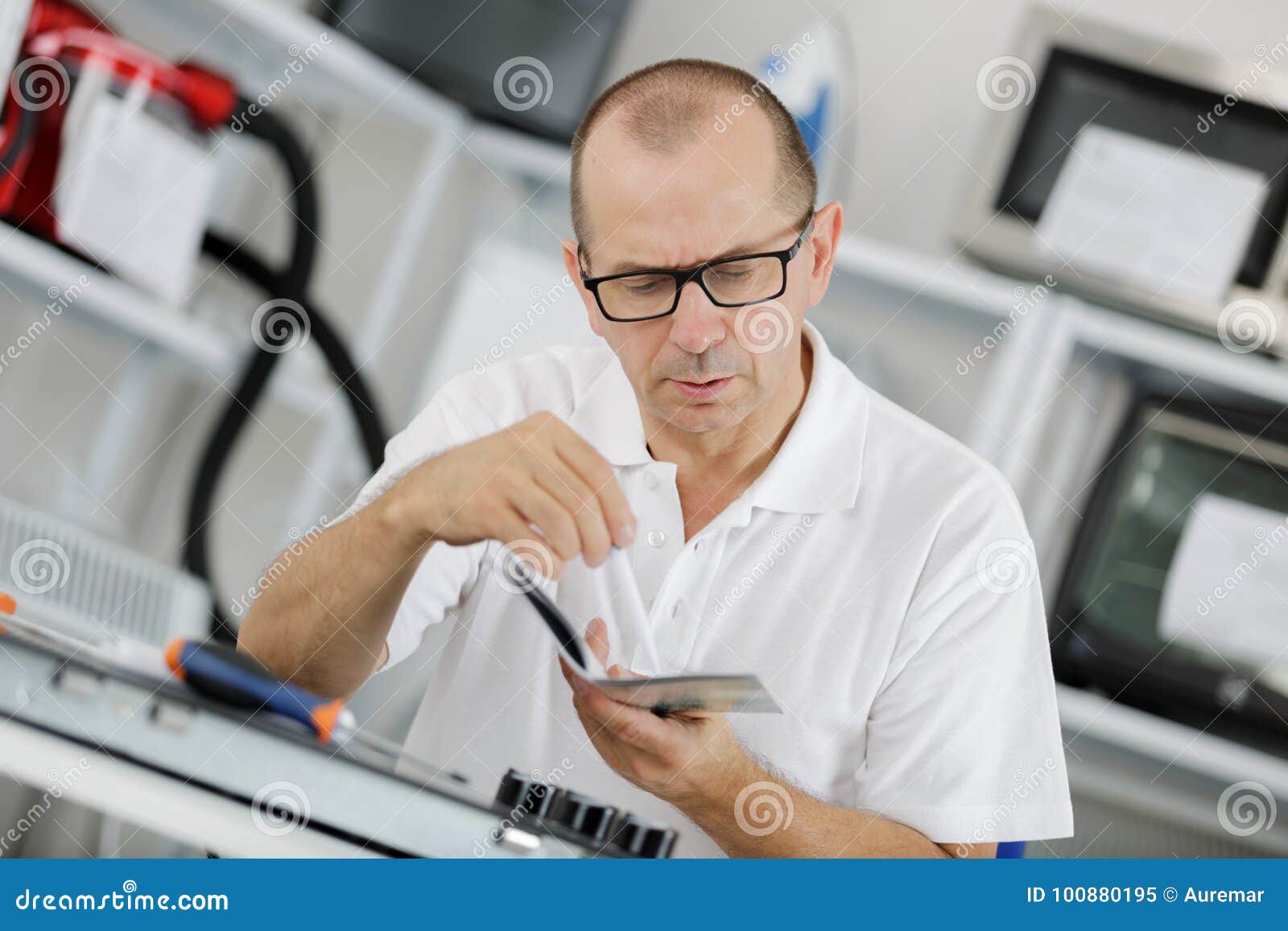 Handy Man Reading Instruction Manual Stock Image - Image of serviceman ...