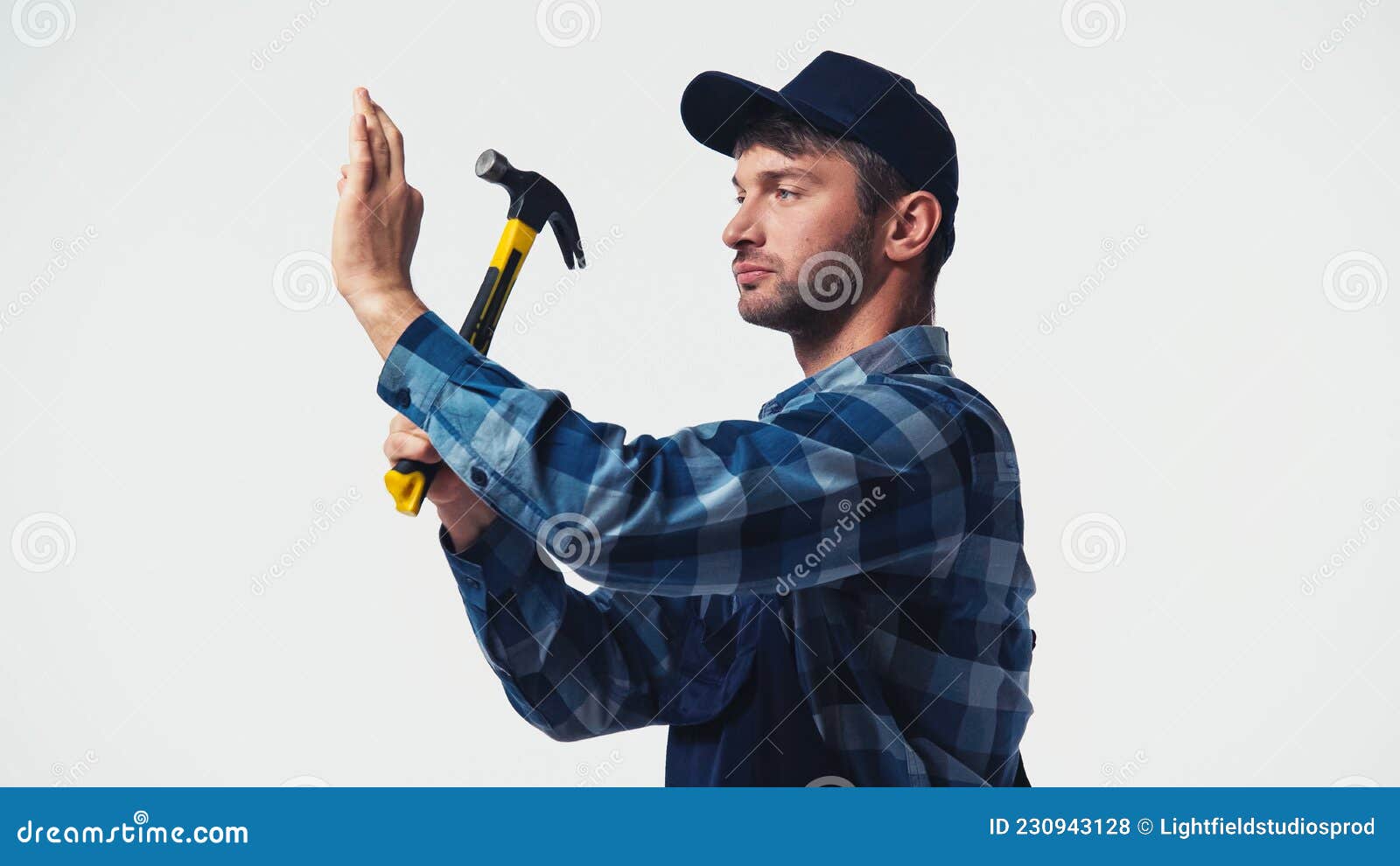 Handyman in Cap Holding Hammer Isolated Stock Photo - Image of isolated ...