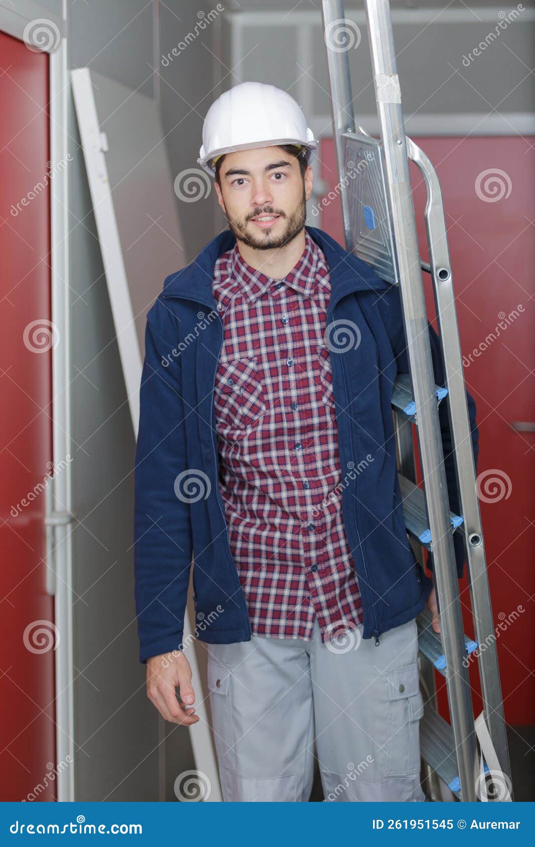 Handyman carrying ladder stock image. Image of renovation - 261951545