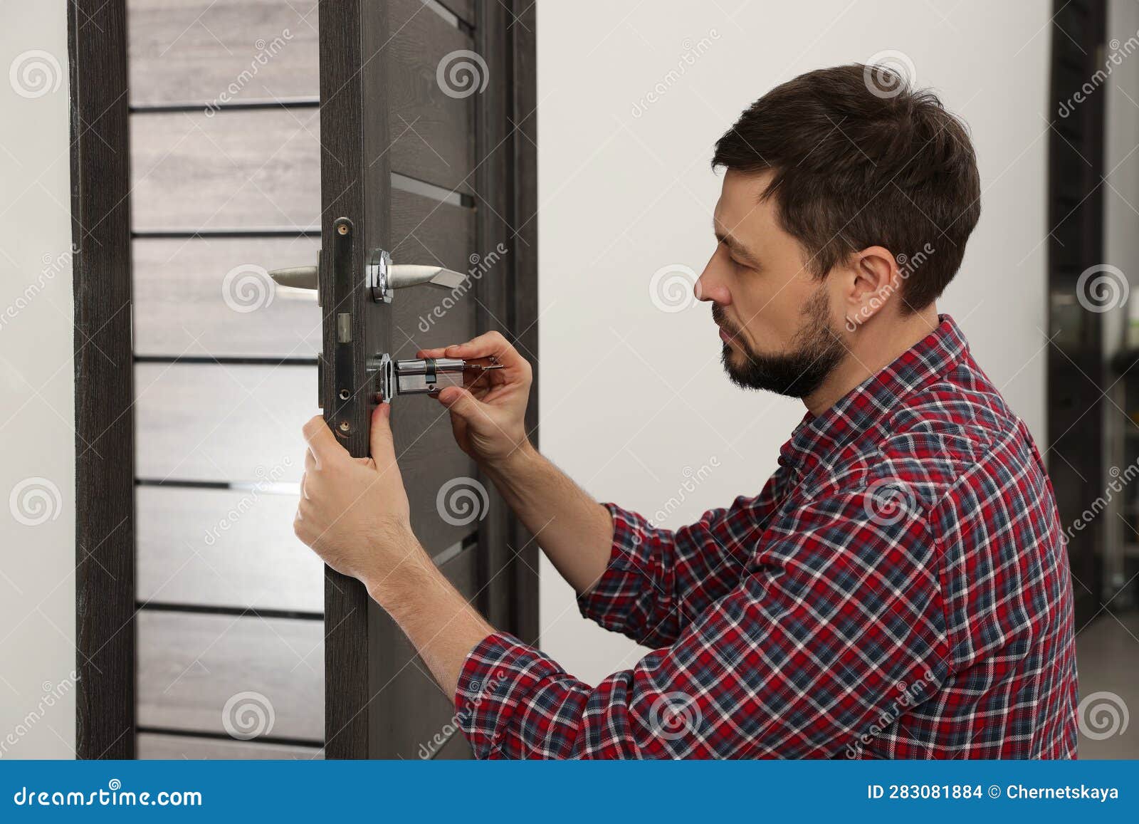 Handyman Changing Core of Door Lock Indoors Stock Photo - Image of ...