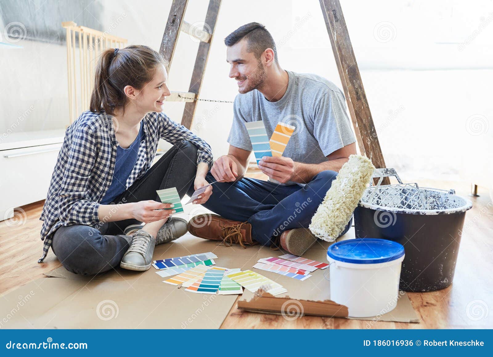 Handyman Couple with Color Pattern for Wall Color Stock Photo - Image ...