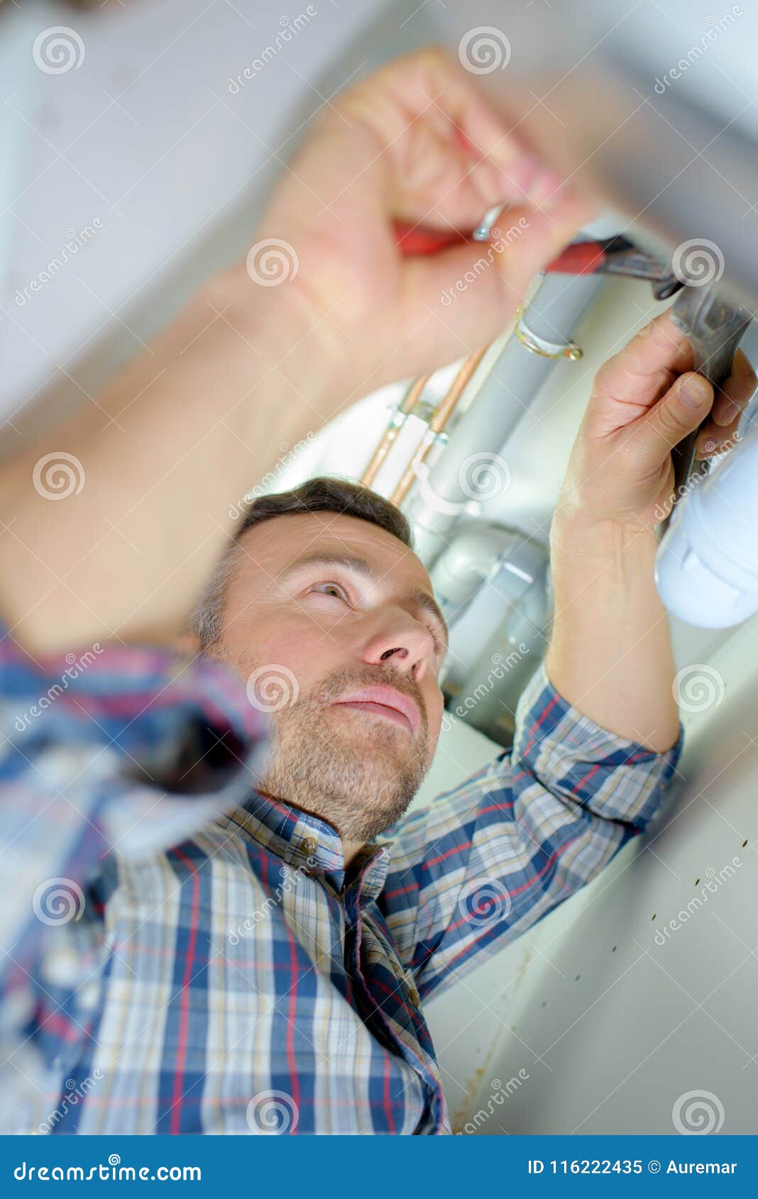 Handyman doing his job stock image. Image of tool, process - 116222435