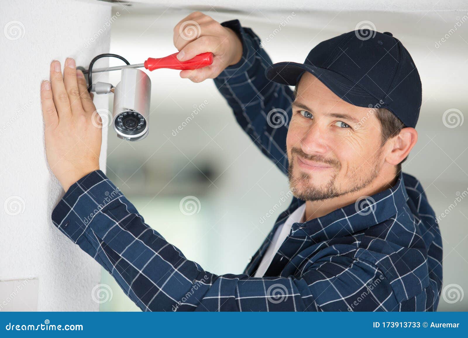Handyman Fixing Cctv Camera To Wall Stock Image - Image of standing ...