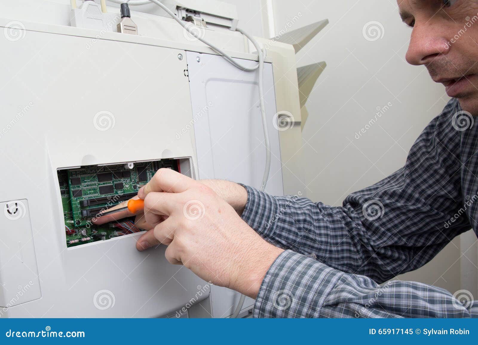 Handyman Fixing the Office Printer in a Office Stock Image - Image of ...