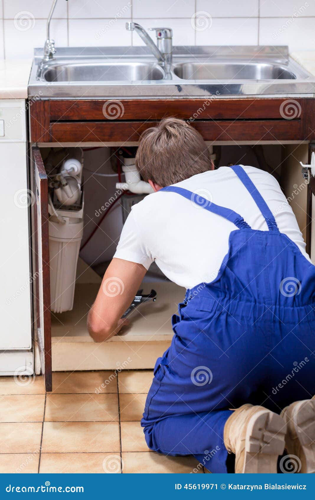 Handyman Fixing Sink in the Kitchen Stock Image - Image of hard ...