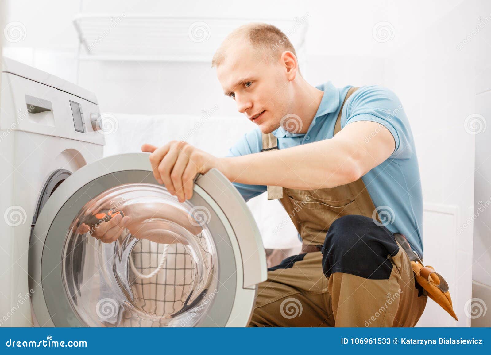 Handyman Fixing Washing Machine Stock Image - Image of leak, worker ...