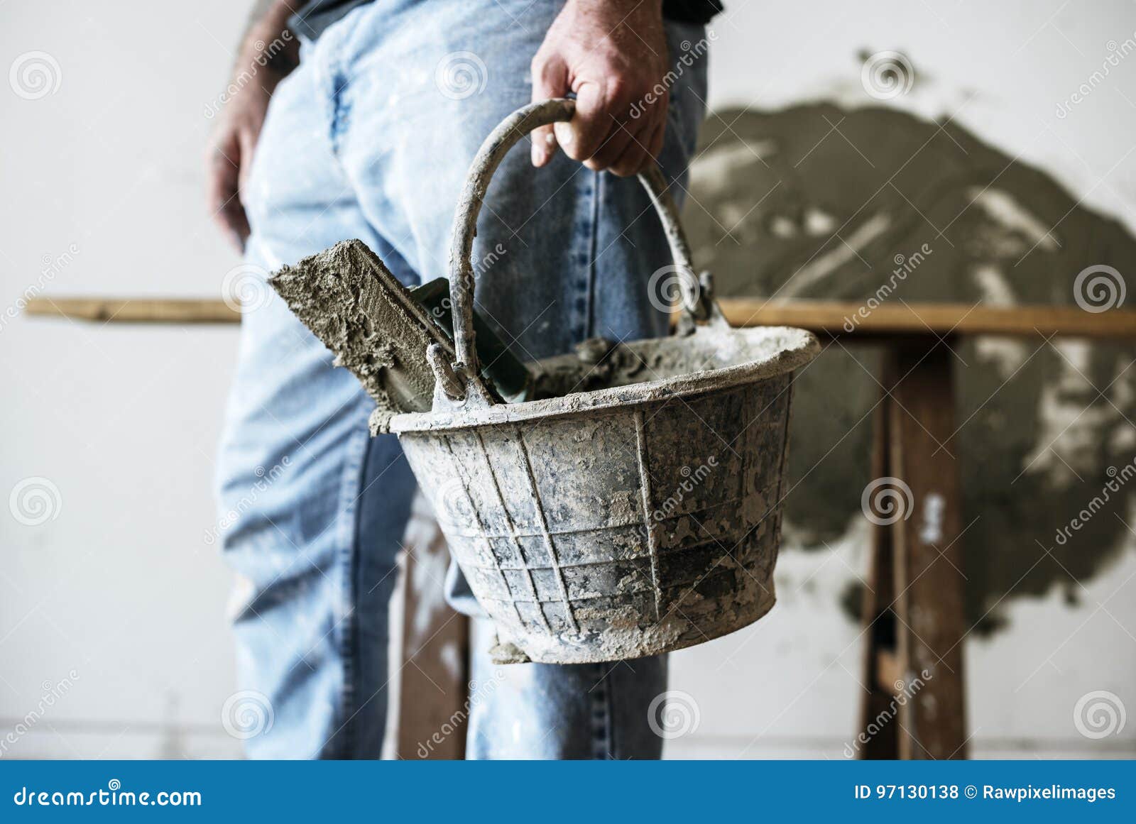 The Use Of Cement For Construction. Knead The Cement In A Bucket. The ...