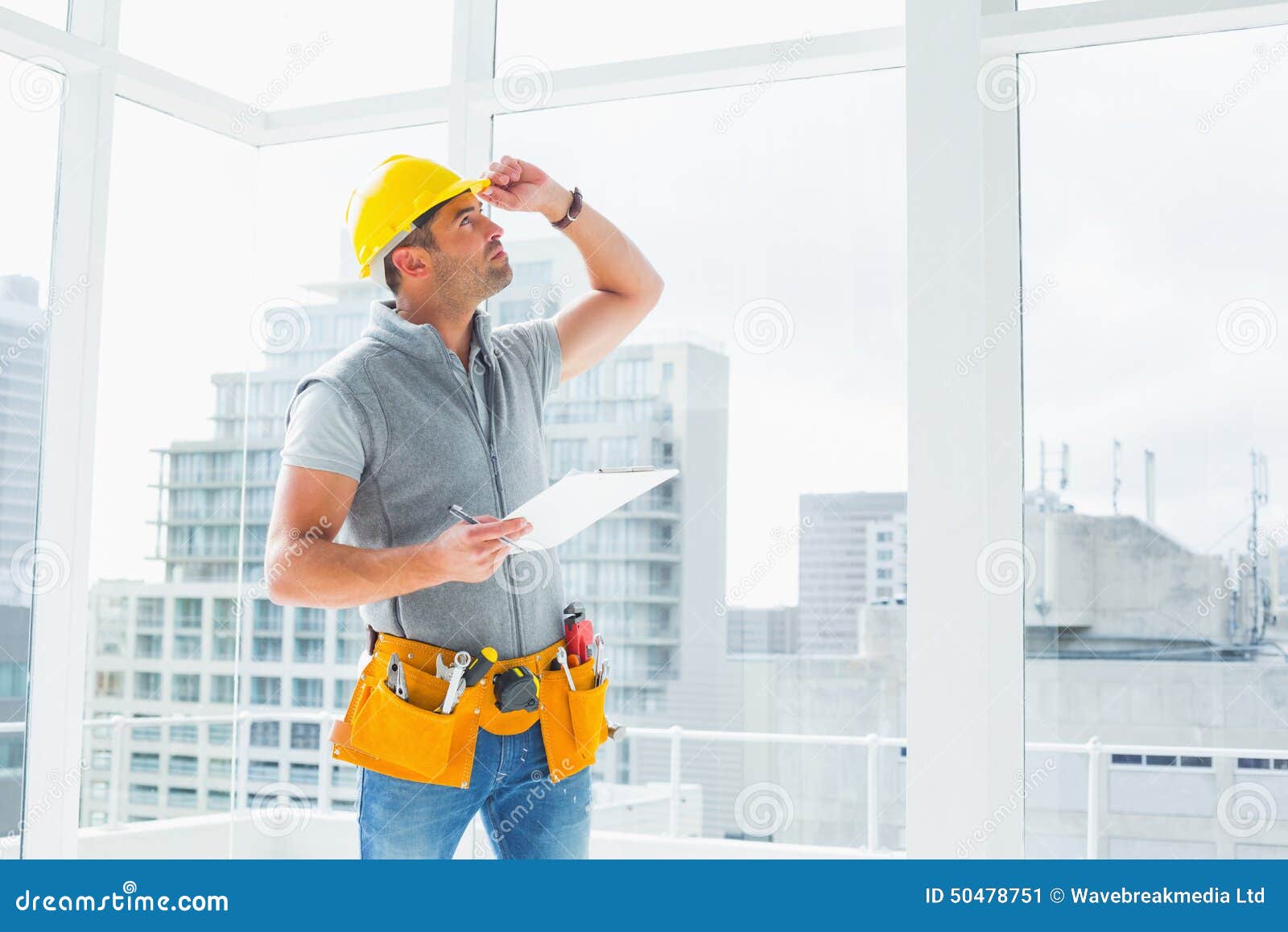 Handyman Inspecting Building Stock Image - Image of adult, handyman ...