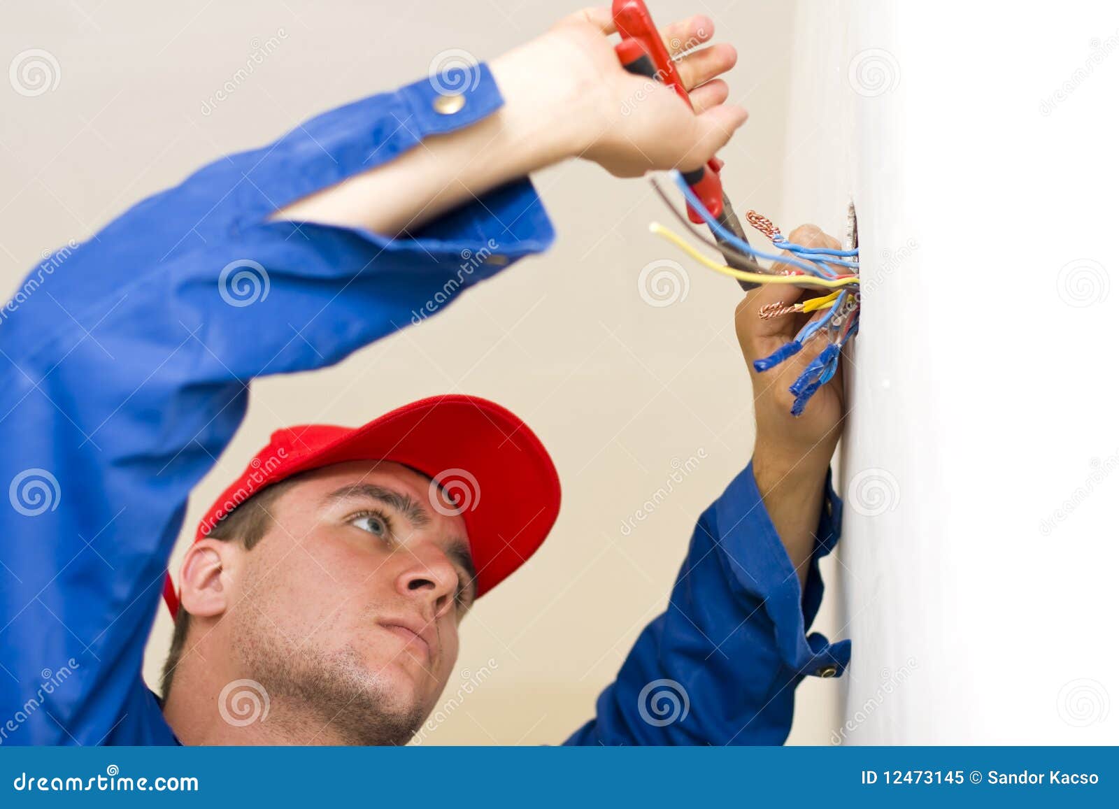Handyman Installing Electricity Stock Image - Image of handy, electric ...