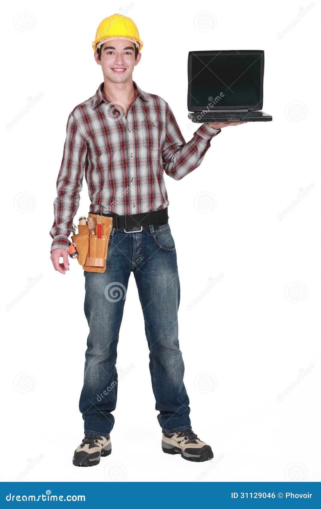 A handyman with a laptop. stock photo. Image of hardhat - 31129046